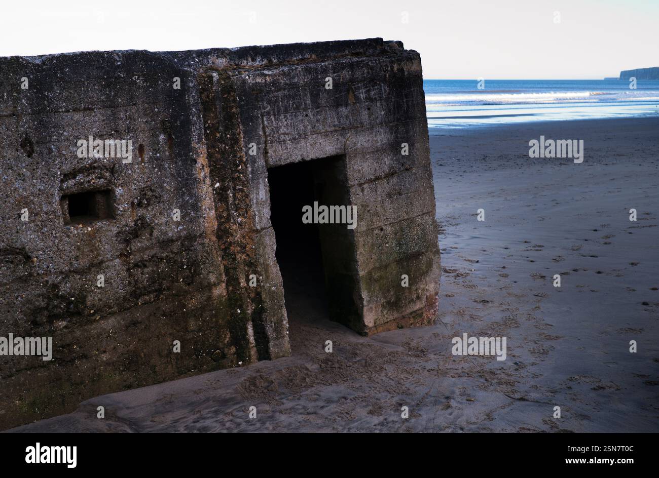 Remains of a WWII concrete pillbox on Filey beach in North Yorkshire ...