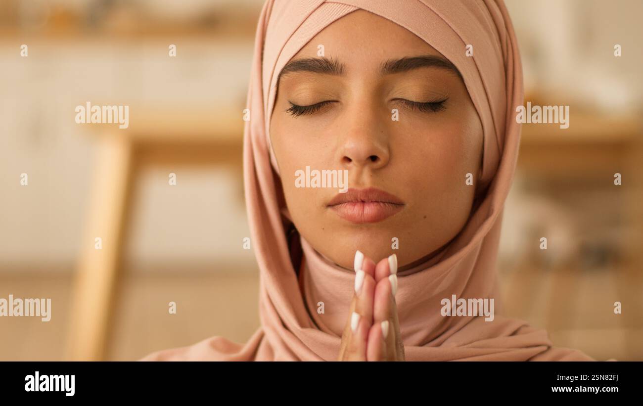 Portrait serious concentrated hopeful religion Islam Indian woman ...