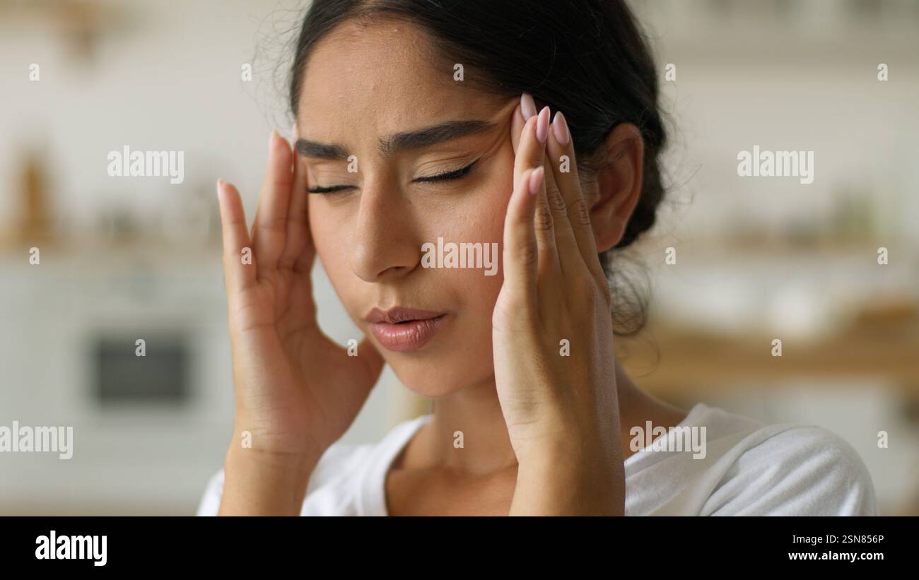 Ill sick tired exhausted fatigued suffering bad feeling Arabian woman ...