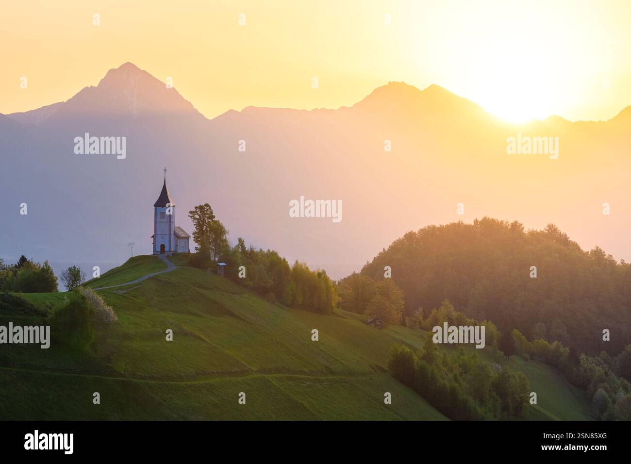 View of the iconic Jamnik church, with Mount Triglav on the background ...