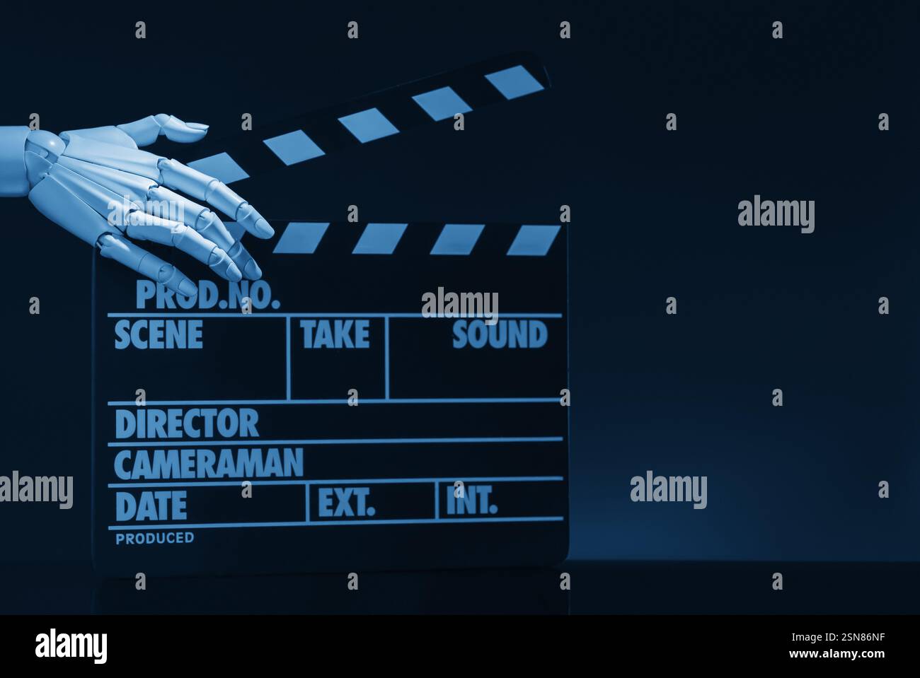 Artificial intelligence. Robot hand with clapper against dark ...