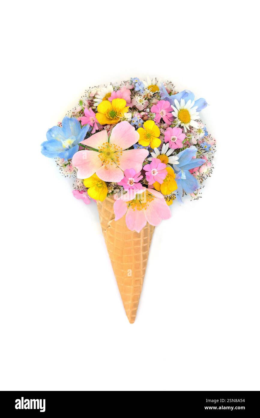 Surreal fun ice cream cornet of spring flowers and blossom on white ...
