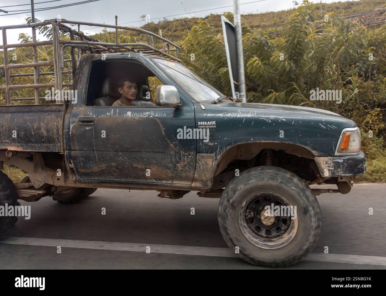 YALA, THAILAND, MAR 03 2024, A pickup truck with a raised chassis is ...