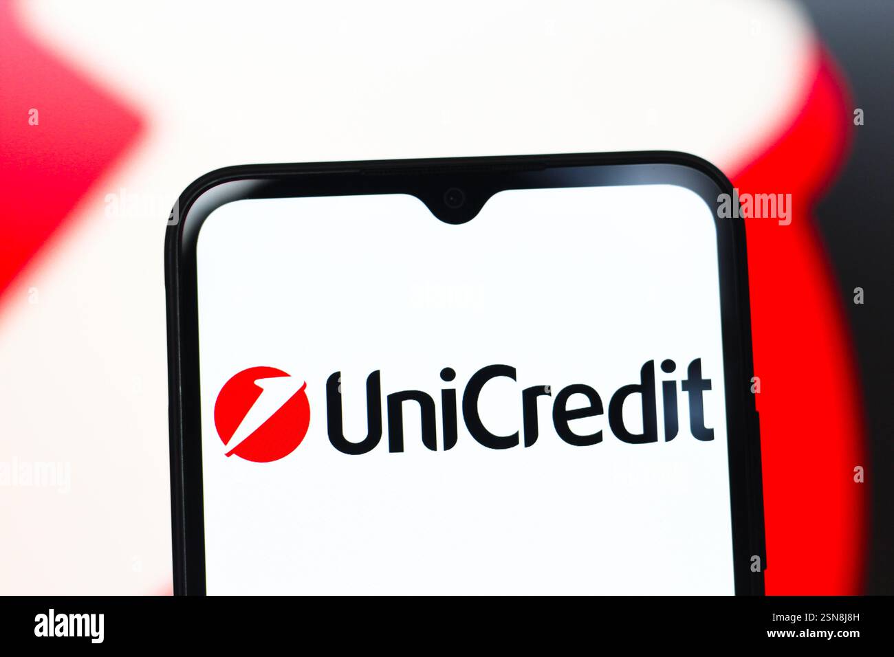 In this photo illustration, the UniCredit logo is seen displayed on a ...