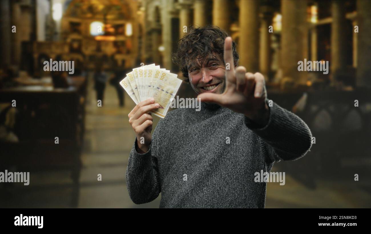 Hispanic man indoors holding norwegian krone banknotes in a church ...