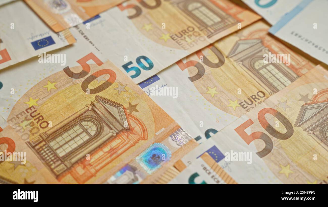 European union euro banknotes scattered showcasing vibrant colors and ...