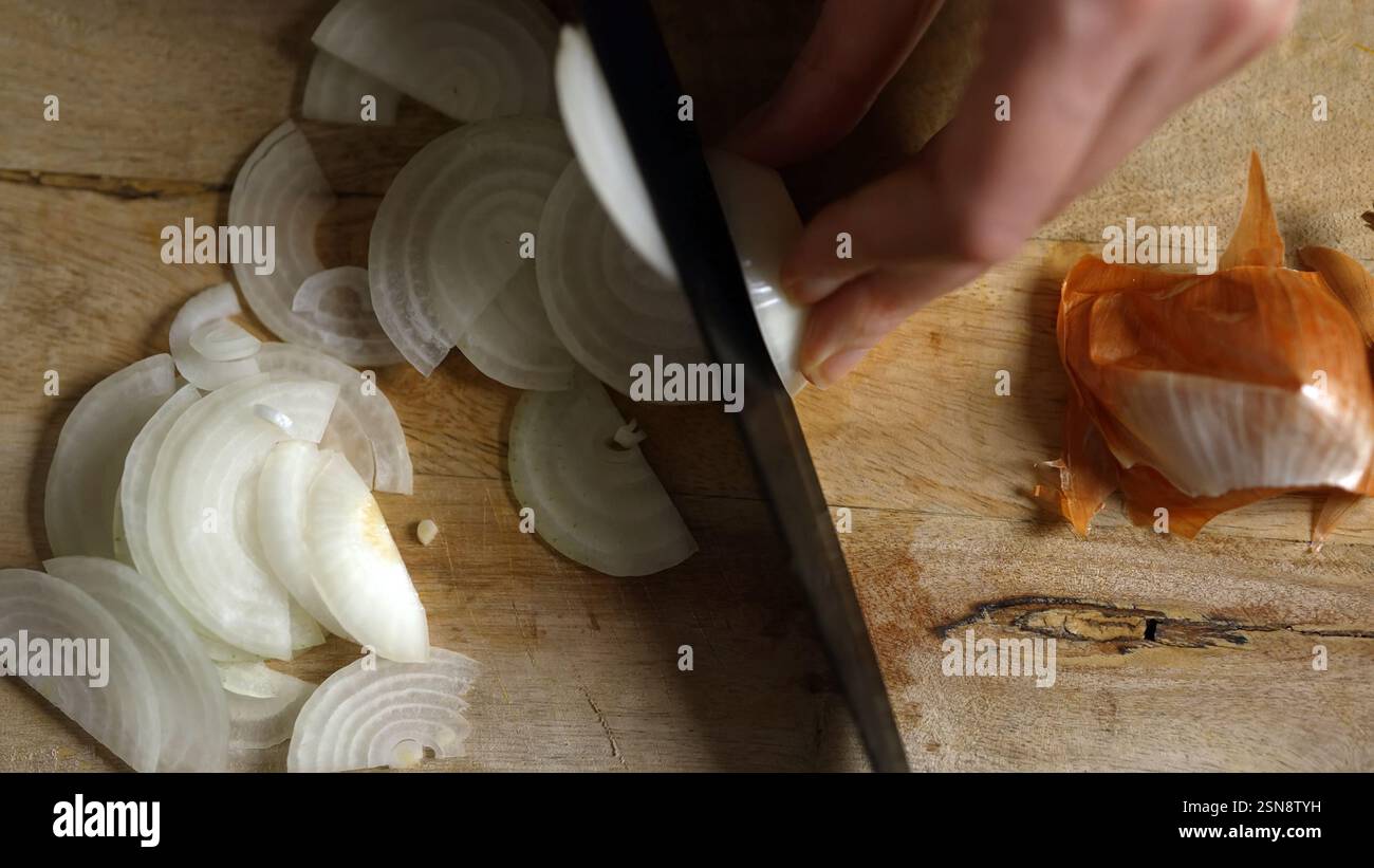 Female cook knife cuts onion hi-res stock photography and images - Alamy