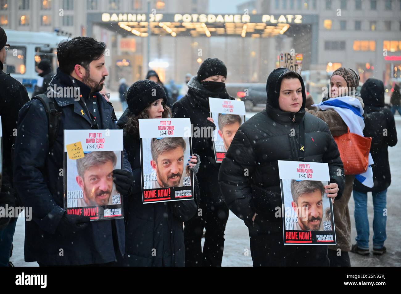 Berlin, Germany. 13th Feb, 2025. Participants stand on Potsdamer Platz ...