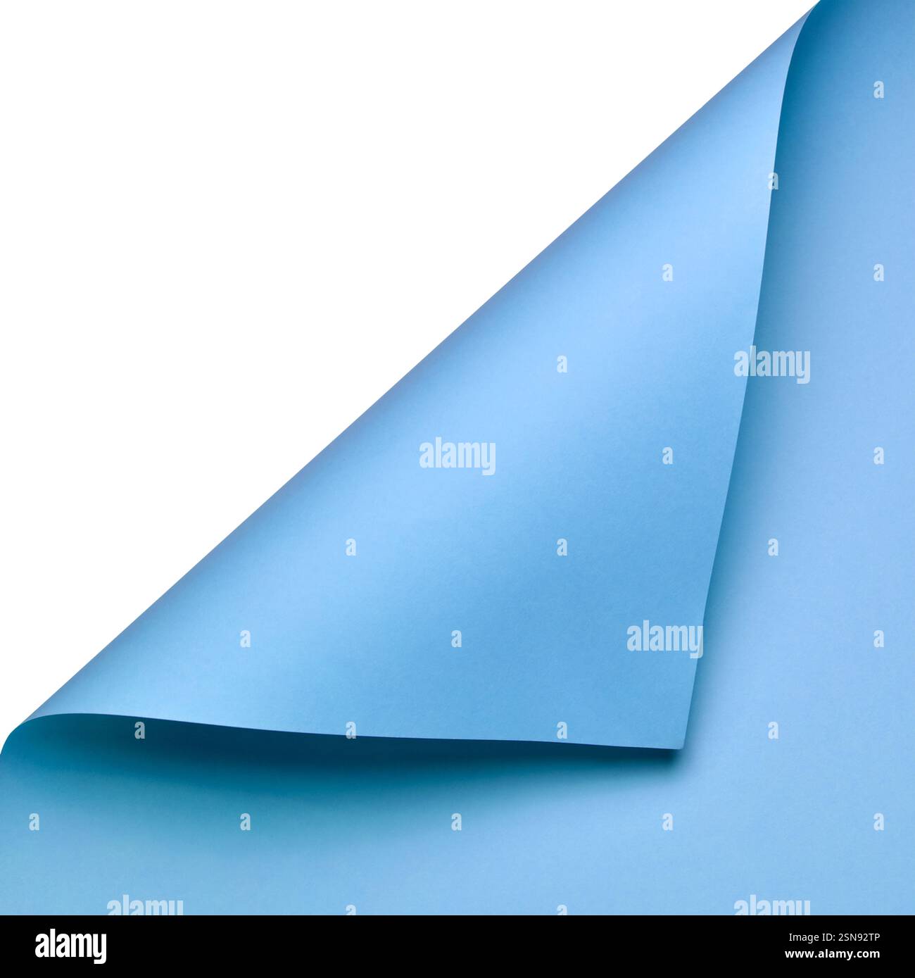 A clean and minimalist composition featuring a sheet of smooth blue ...