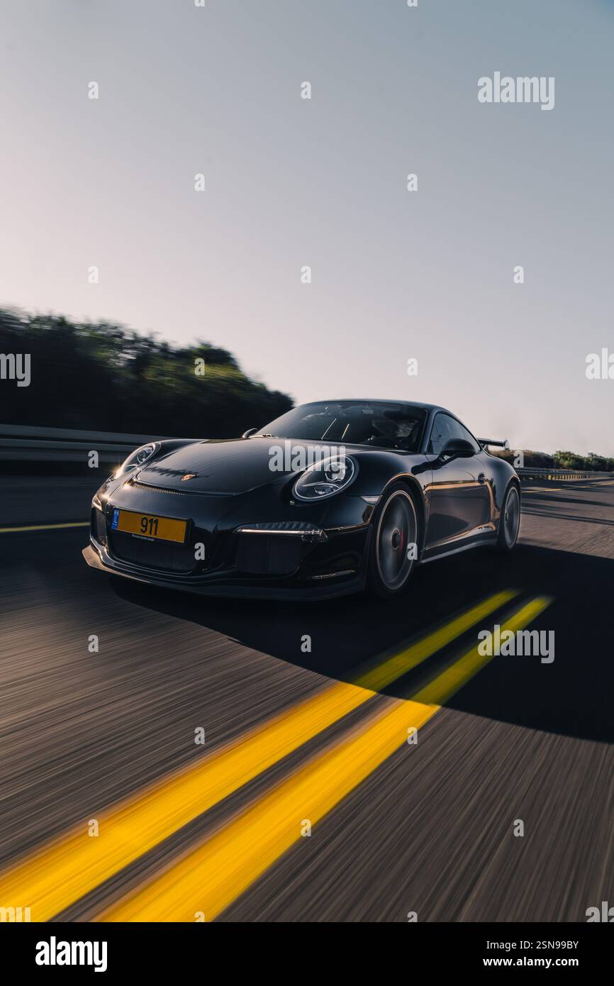 Porsche 911 driving fast Stock Photo - Alamy