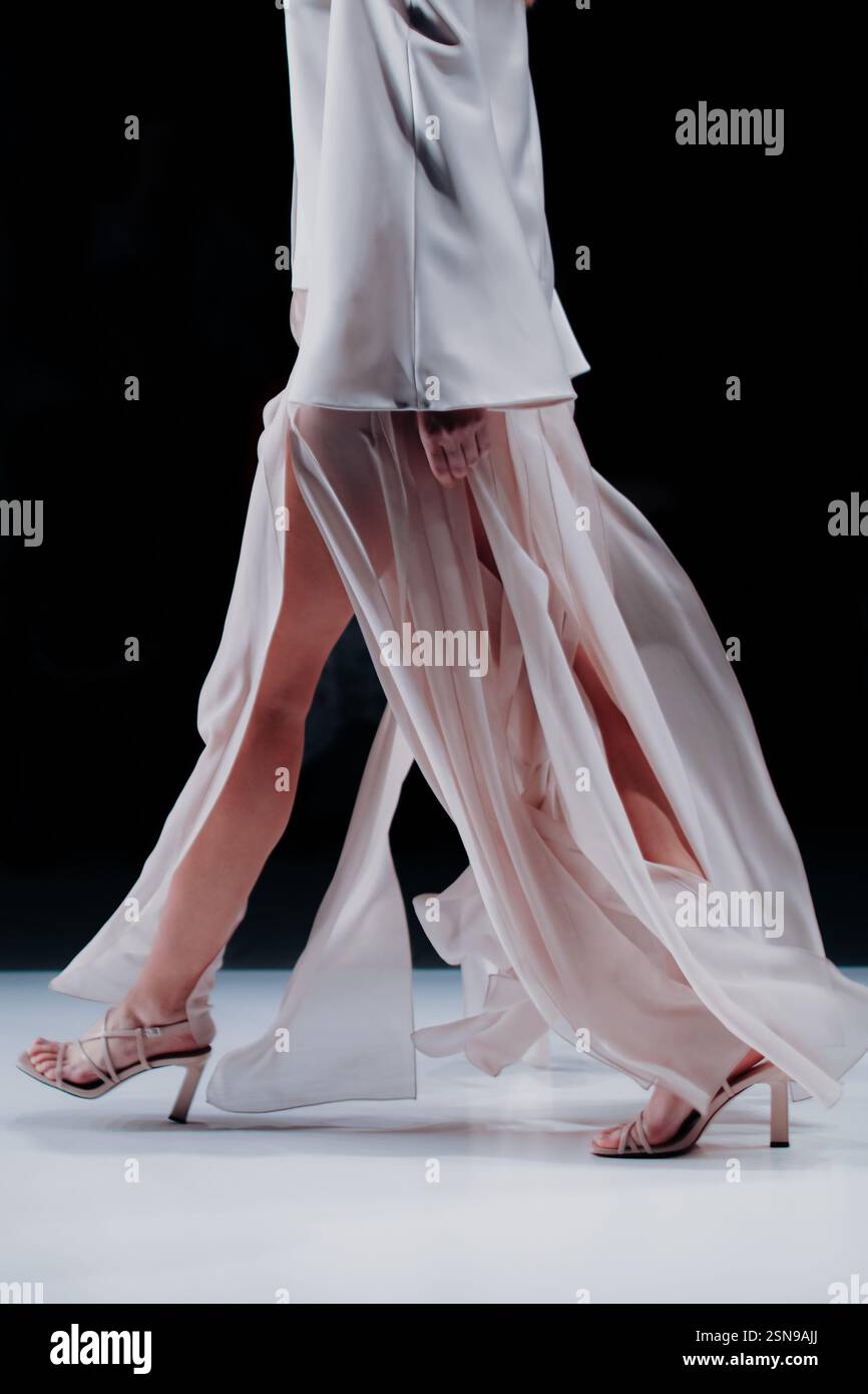 Elegant women's clothing details of fashion white satin skirt and high ...