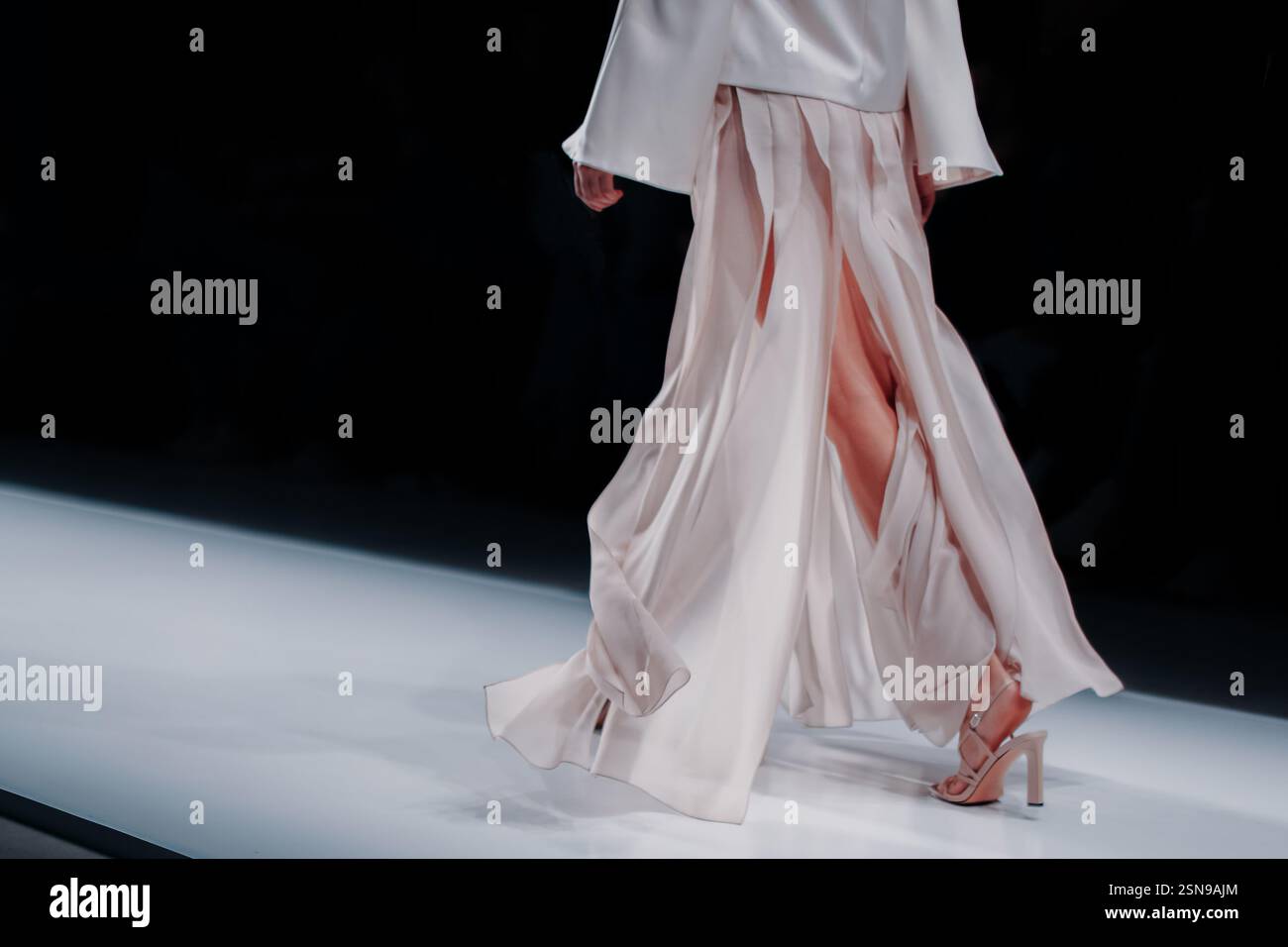 Elegant women's clothing details of fashion white satin skirt and high ...