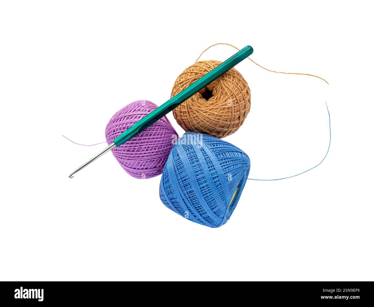 Ball of yarn and crochet hook isolated on white background. Skeins of ...