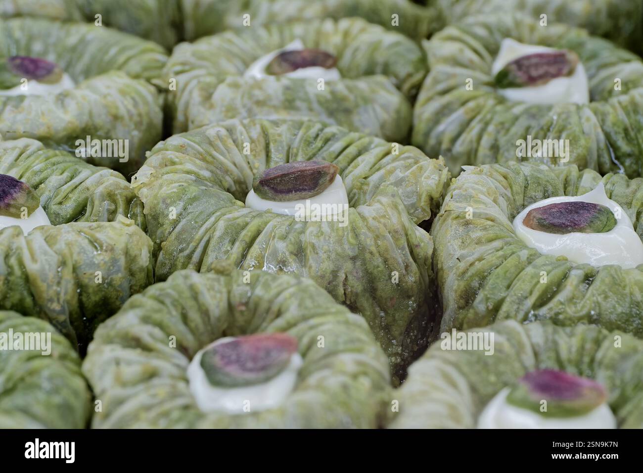 Baklava, a traditional Turkish dessert made from puff pastry filled ...