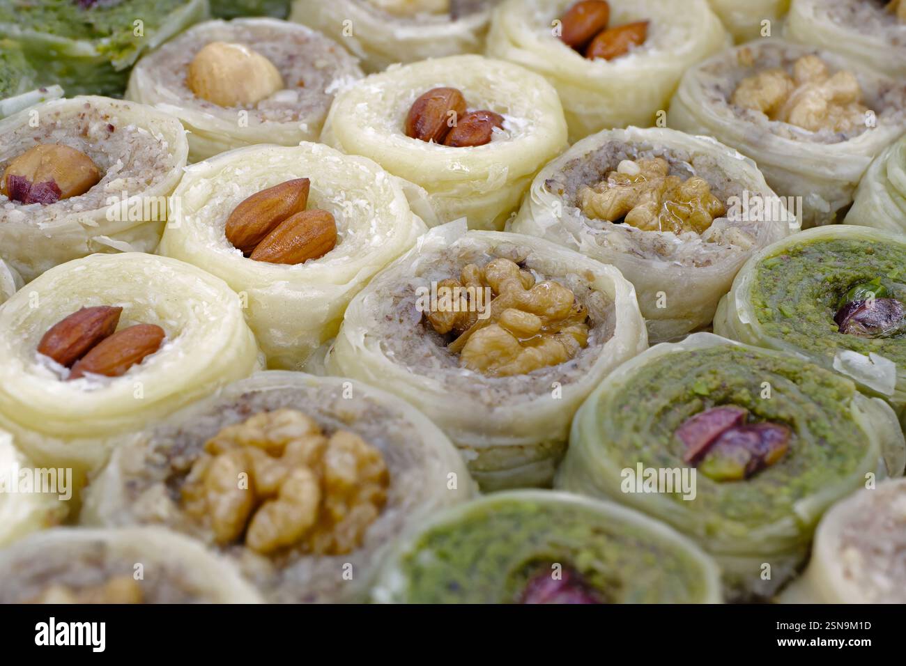 Baklava, a traditional Turkish dessert made from puff pastry filled ...
