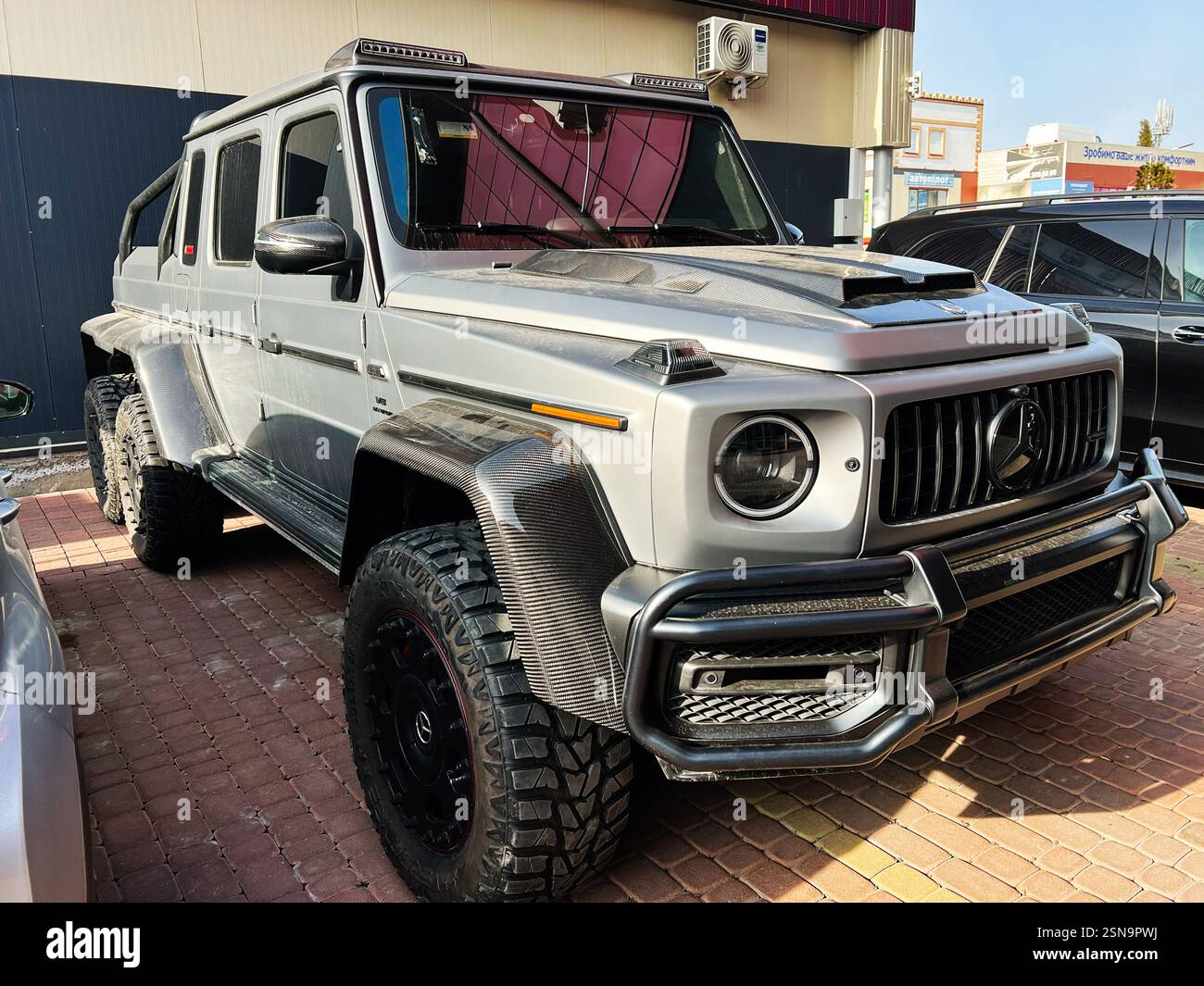 Lviv, Ukraine - February 12, 2025: Silver off-road Mercedes AMG G 63 ...
