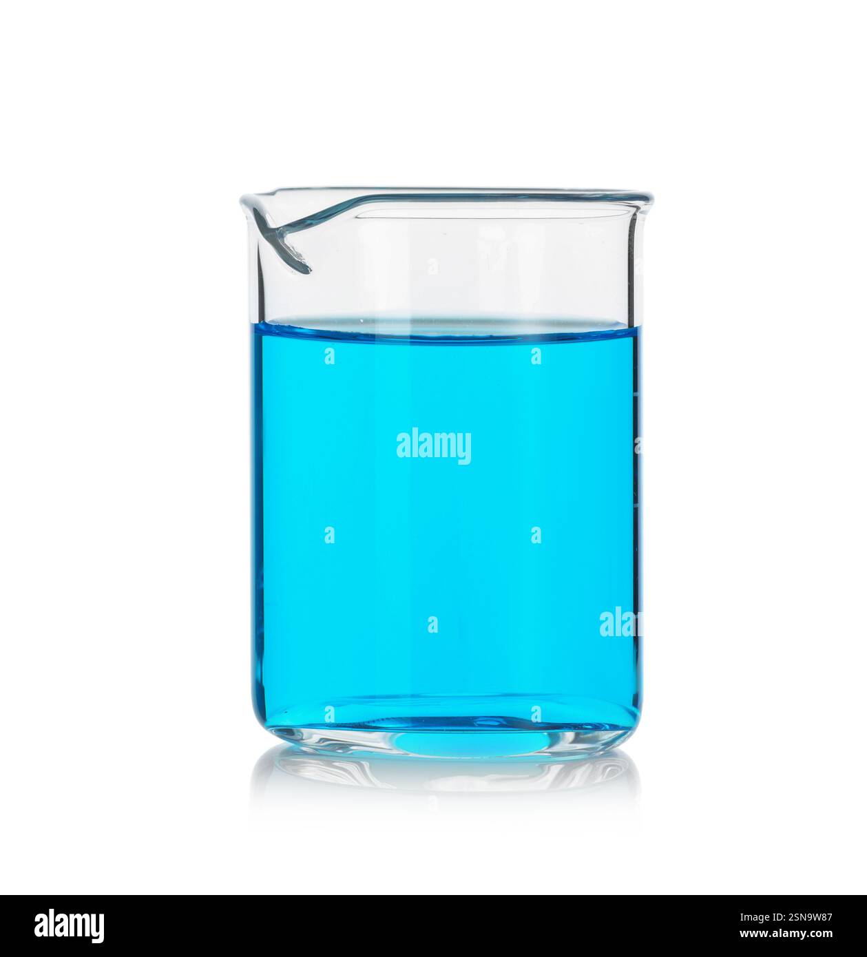 Glass beaker with light blue liquid on mirror surface against white ...