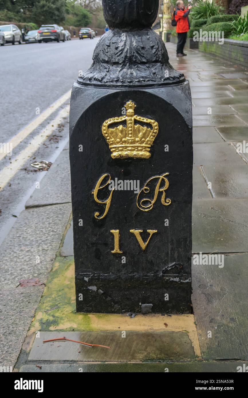 Black lamp post on Outer Circle, Marylebone, London, bearing the gold ...