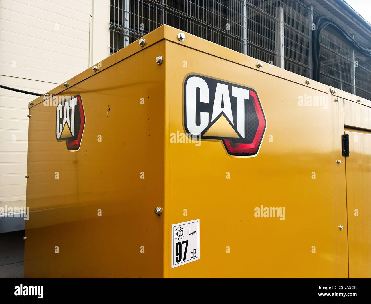 Lviv, Ukraine - February 12, 2025: Yellow industrial CAT equipment ...