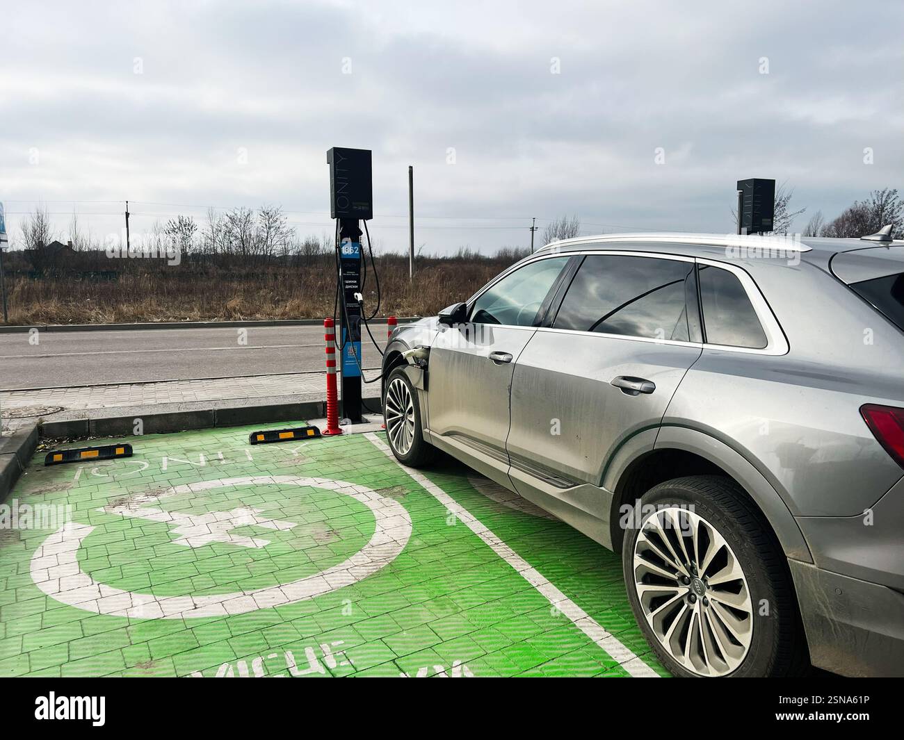 Lviv, Ukraine - February 12, 2025: Grey electric vehicle Audi E tron ...