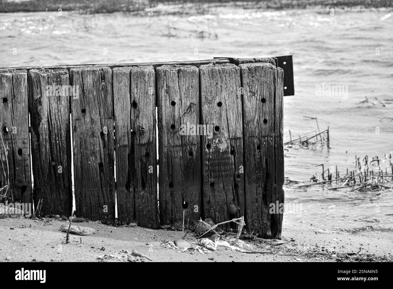 A weathered wooden dock by the water. Jamaica Bay New York City Stock ...