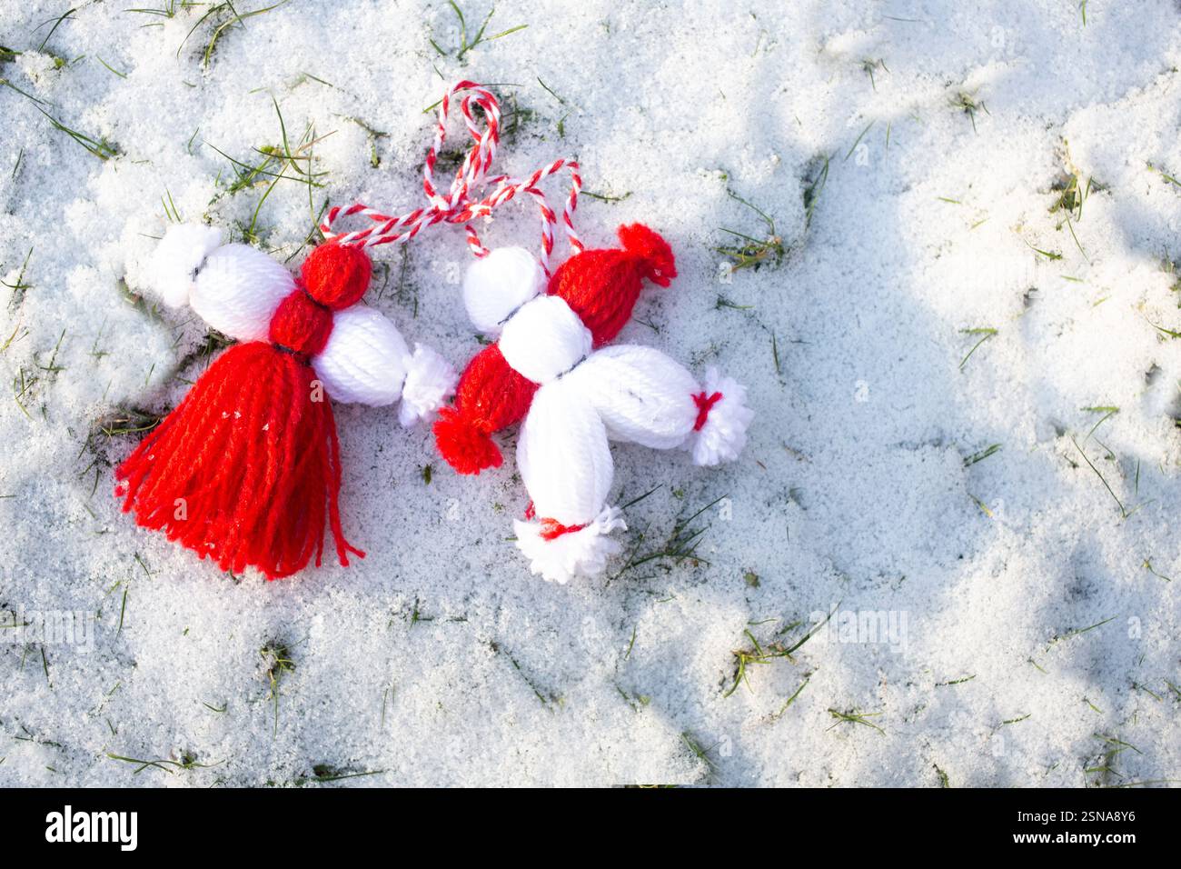 Traditional martenitsa on snow hi-res stock photography and images - Alamy