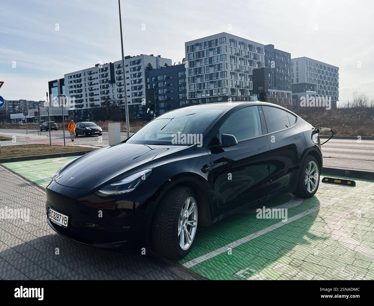 Lviv, Ukraine - February 12, 2025: A sleek black Tesla Model Y electric ...