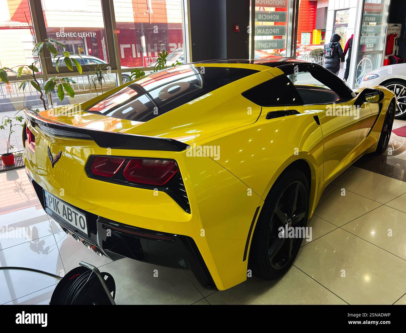 Lviv, Ukraine - February 12, 2025: A sleek yellow sports Chevrolet ...