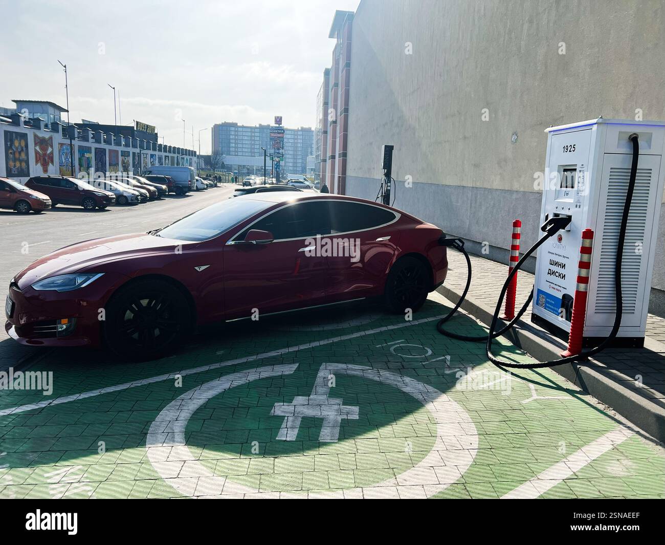 Lviv, Ukraine - February 12, 2025: A red Tesla Model S electric vehicle ...