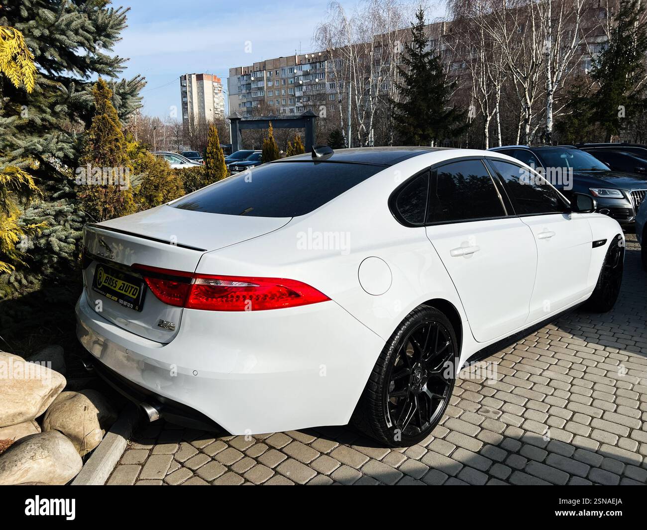 Lviv, Ukraine - February 12, 2025: A white Jaguar XF sedan with tinted ...