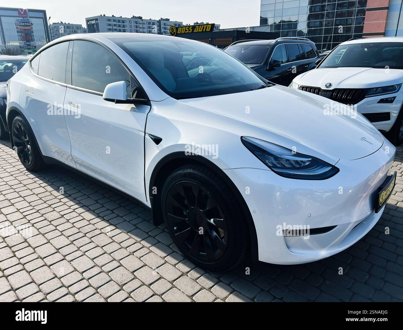 Lviv, Ukraine - February 12, 2025: Sleek white Tesla Model Y electric ...