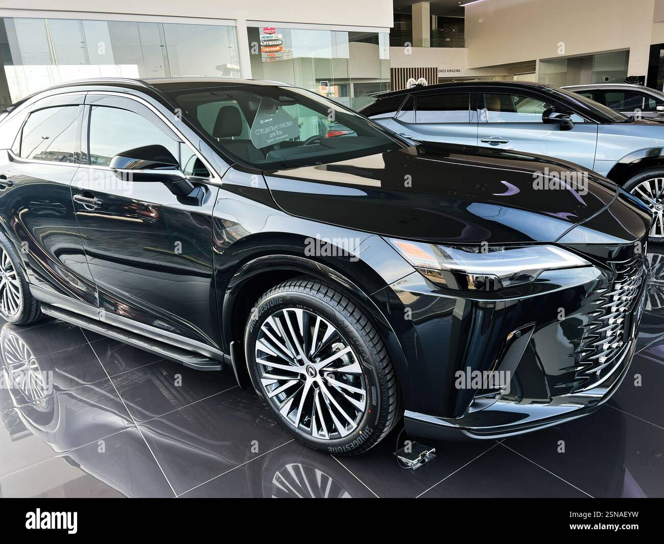 Lviv, Ukraine - February 12, 2025: Luxury black Lexus RX SUV displayed ...