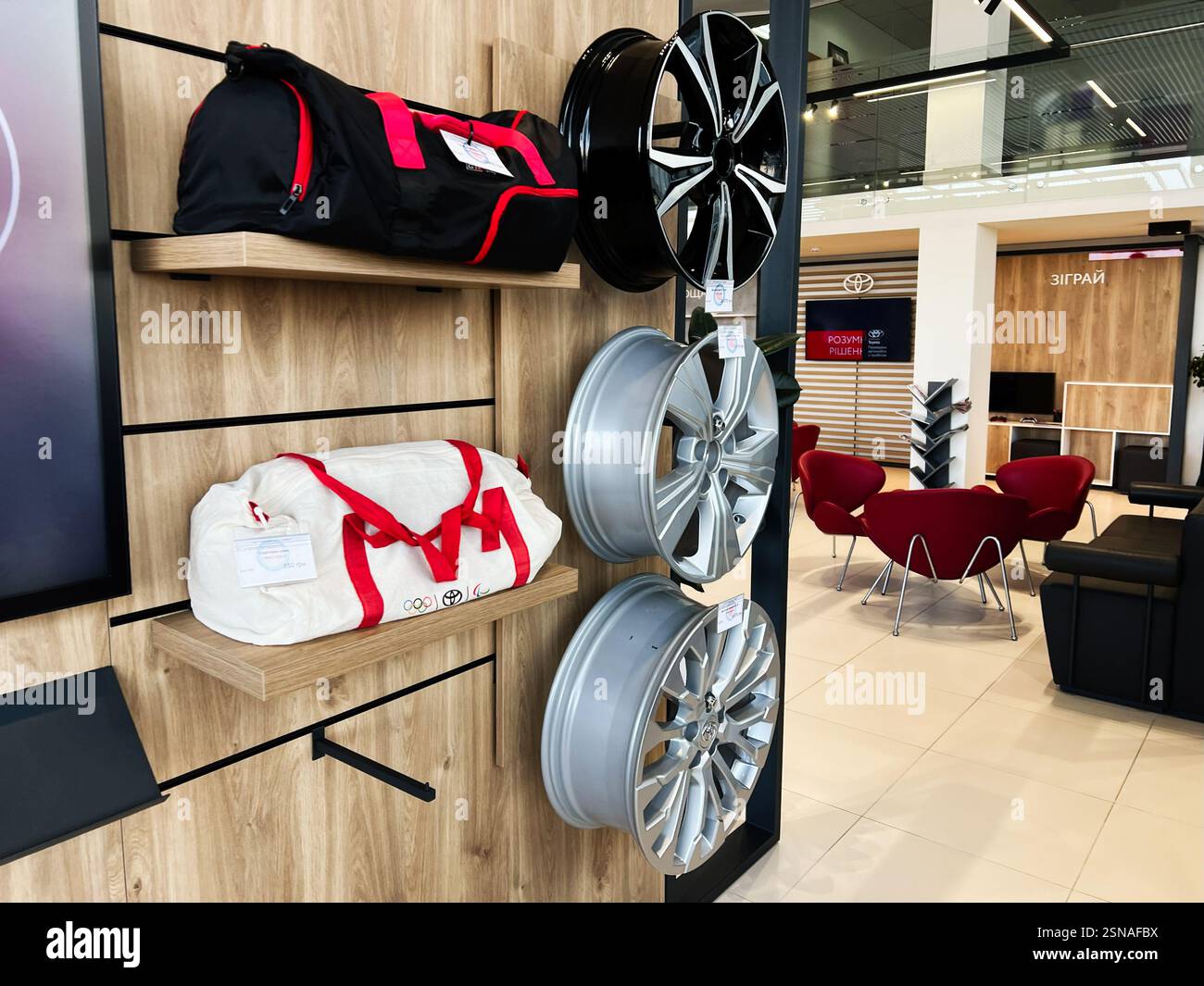 Lviv, Ukraine - February 12, 2025: Car dealership showroom featuring ...