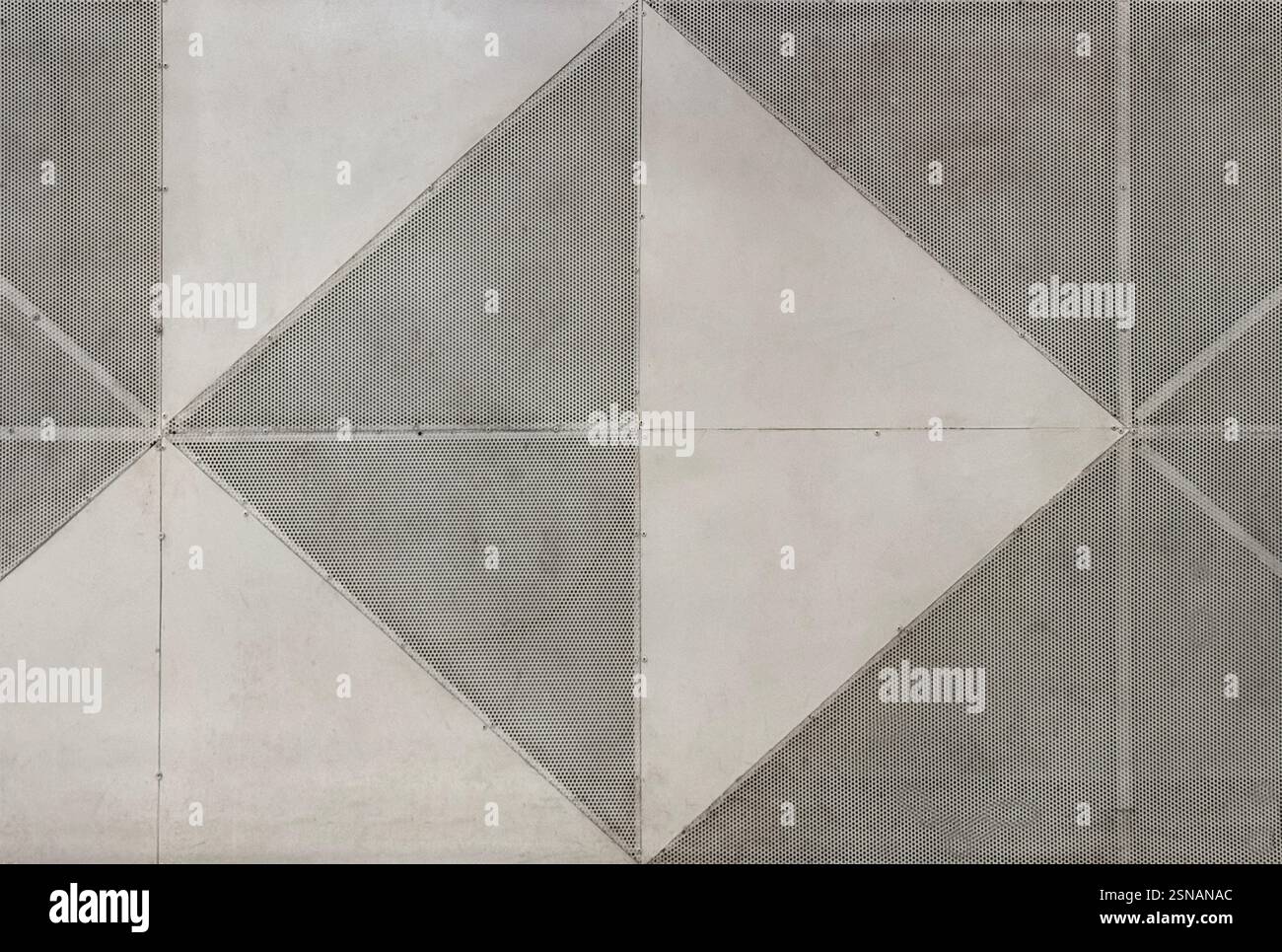 Perforated metal plate cut and arranged in diamond pattern. Grey and ...