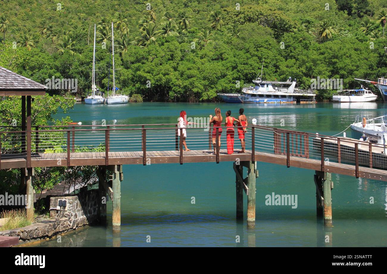 Girls on the bridge, St Lucia Stock Photo - Alamy