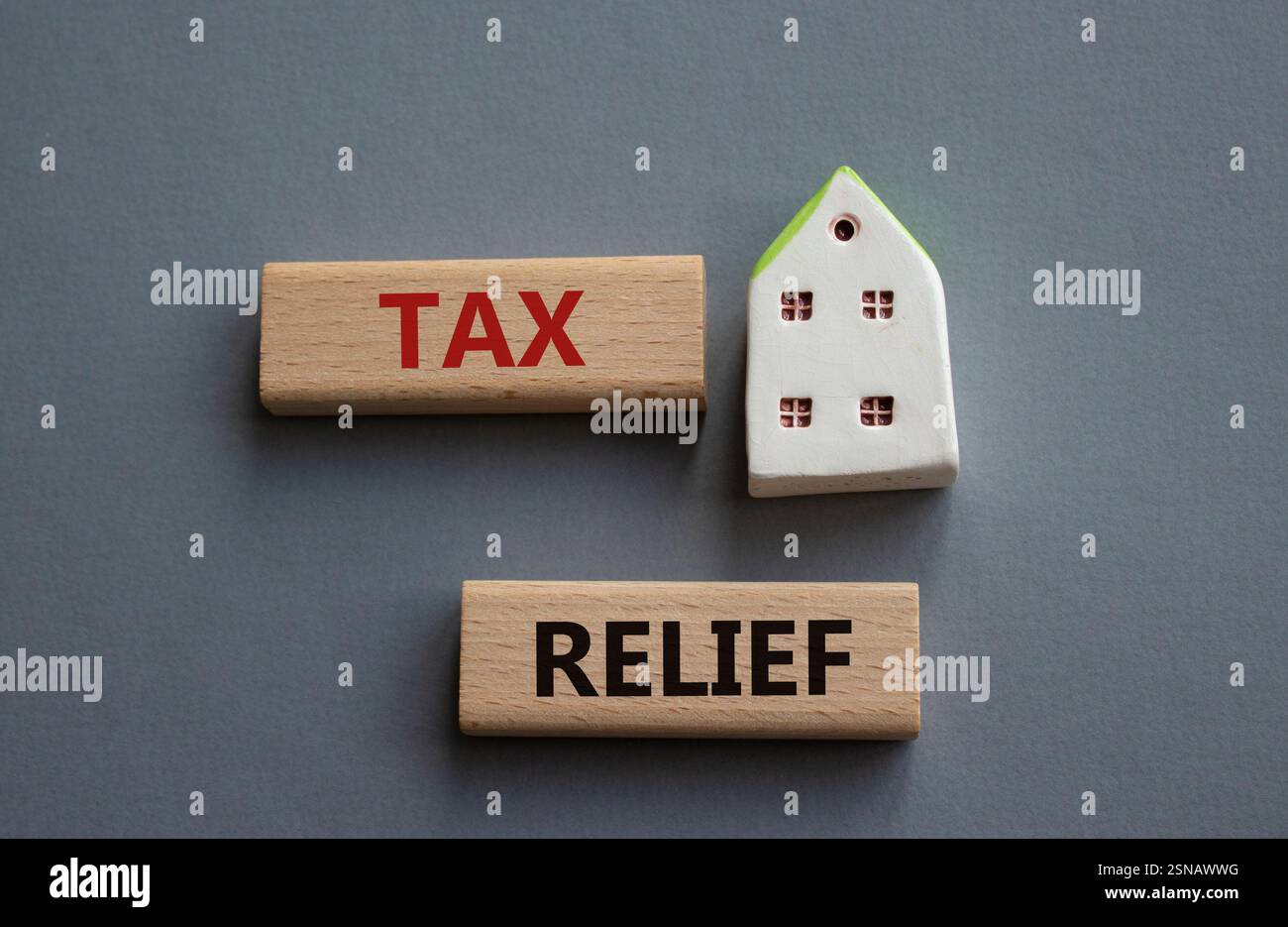 Tax Relief symbol. Concept word Tax Relief on wooden blocks. Beautiful ...