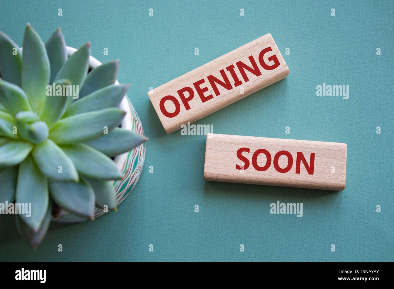 Opening soon symbol. Concept word Opening soon on wooden blocks ...