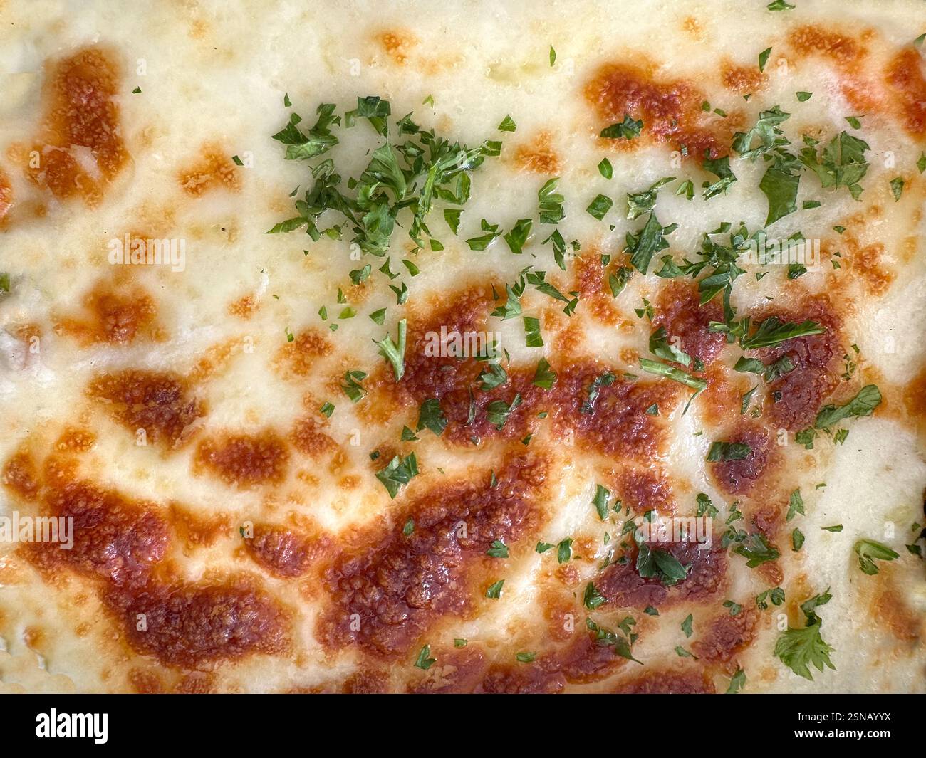 Classic Italian baked casserole with bacon and risotto inside. Topped ...