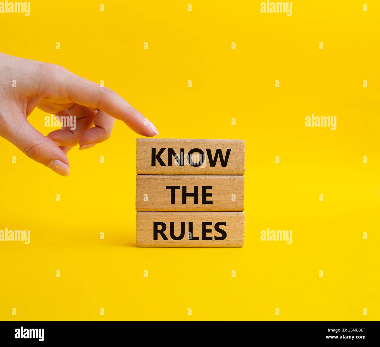 Know the rules symbol. Wooden blocks with words Know the rules ...