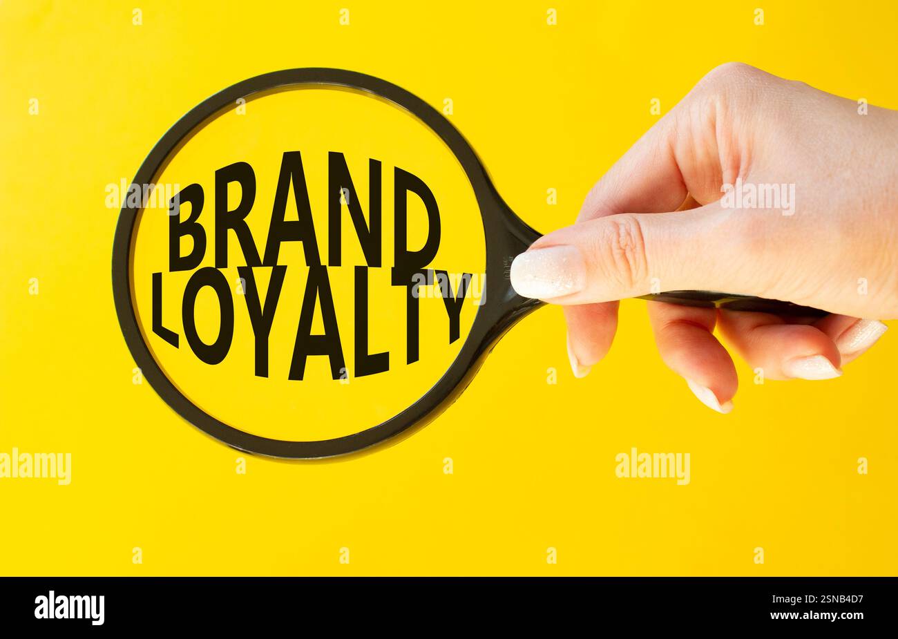 Brand Loyalty symbol. Concept word Brand Loyalty on magnifying glass ...