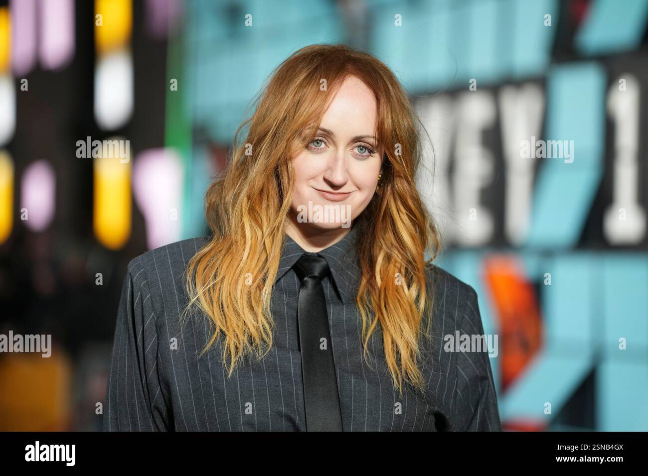 Brittany Broski poses for photographers upon arrival at the World ...