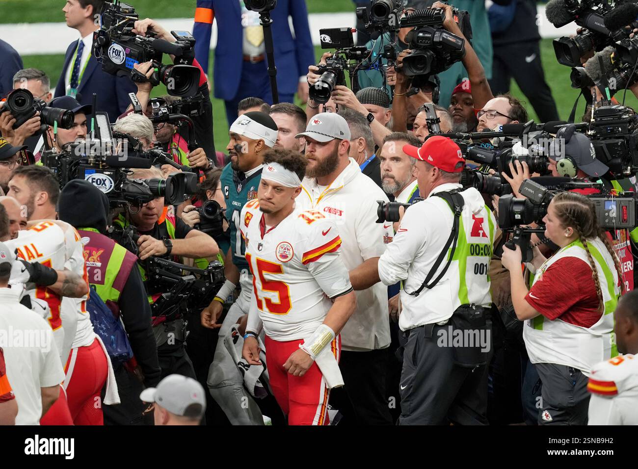 Kansas City Chiefs quarterback Patrick Mahomes (15) turns away from ...