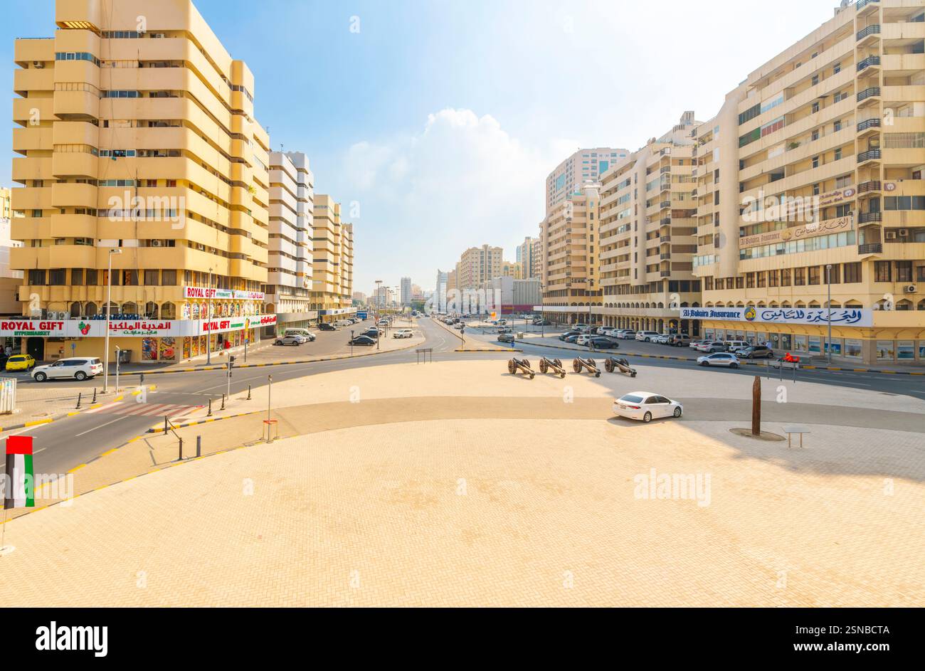 View of Hisn Avenue towards the public Rolla Square Park and Sharjah ...