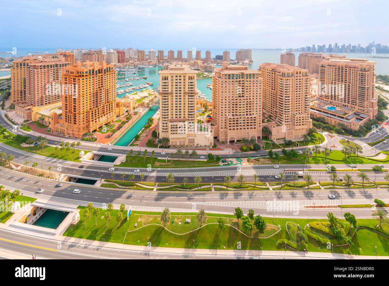 High angle panoramic view of Doha Pearl Island with the city skyline ...
