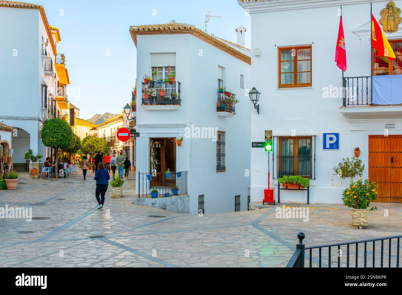 Shops and cafes along Calle Ronda, the main street of the Spanish White ...