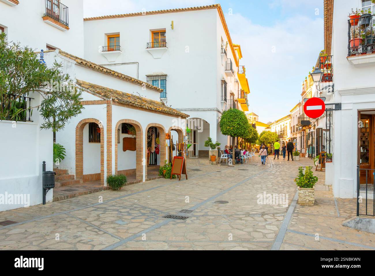 Shops and cafes along Calle Ronda, the main street of the Spanish White ...