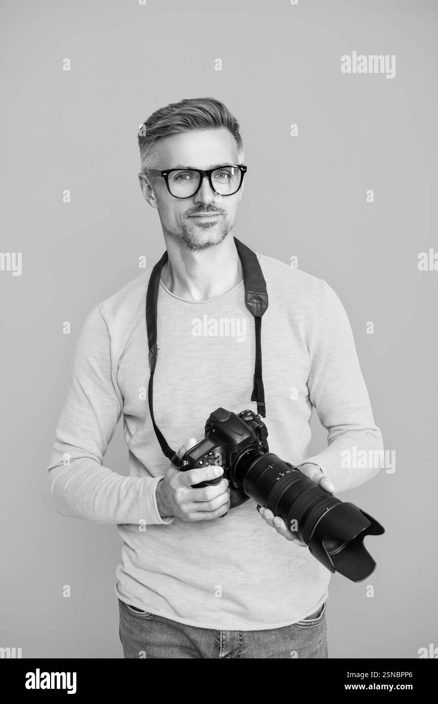 Professional photography. Shooting session. Photoshoot. Man taking ...