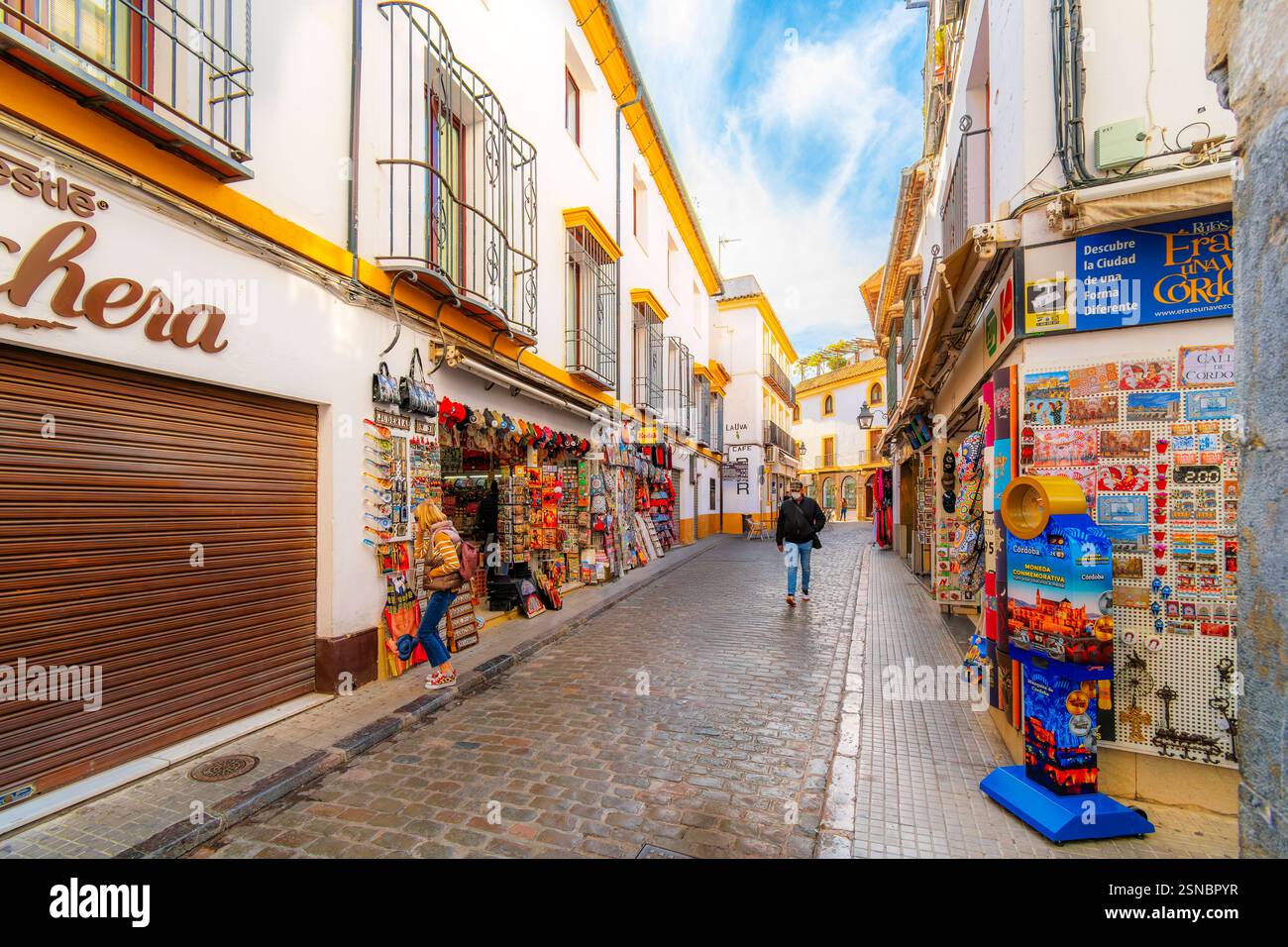 Cobblestone streets and alleys of colorful shops and cafes in the ...