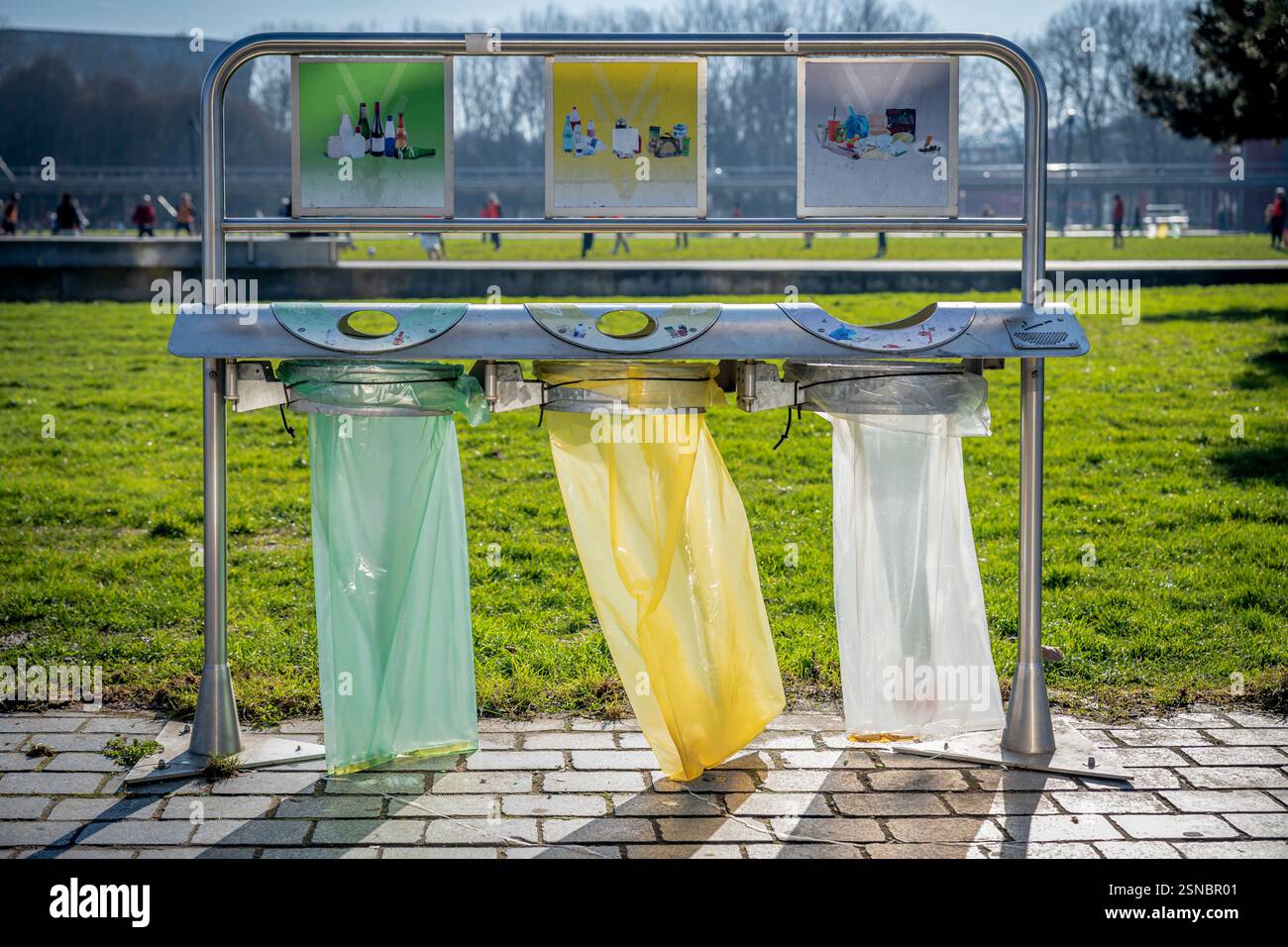 Paris, France - 02 02 2025: Three green, yellow and white plastic ...