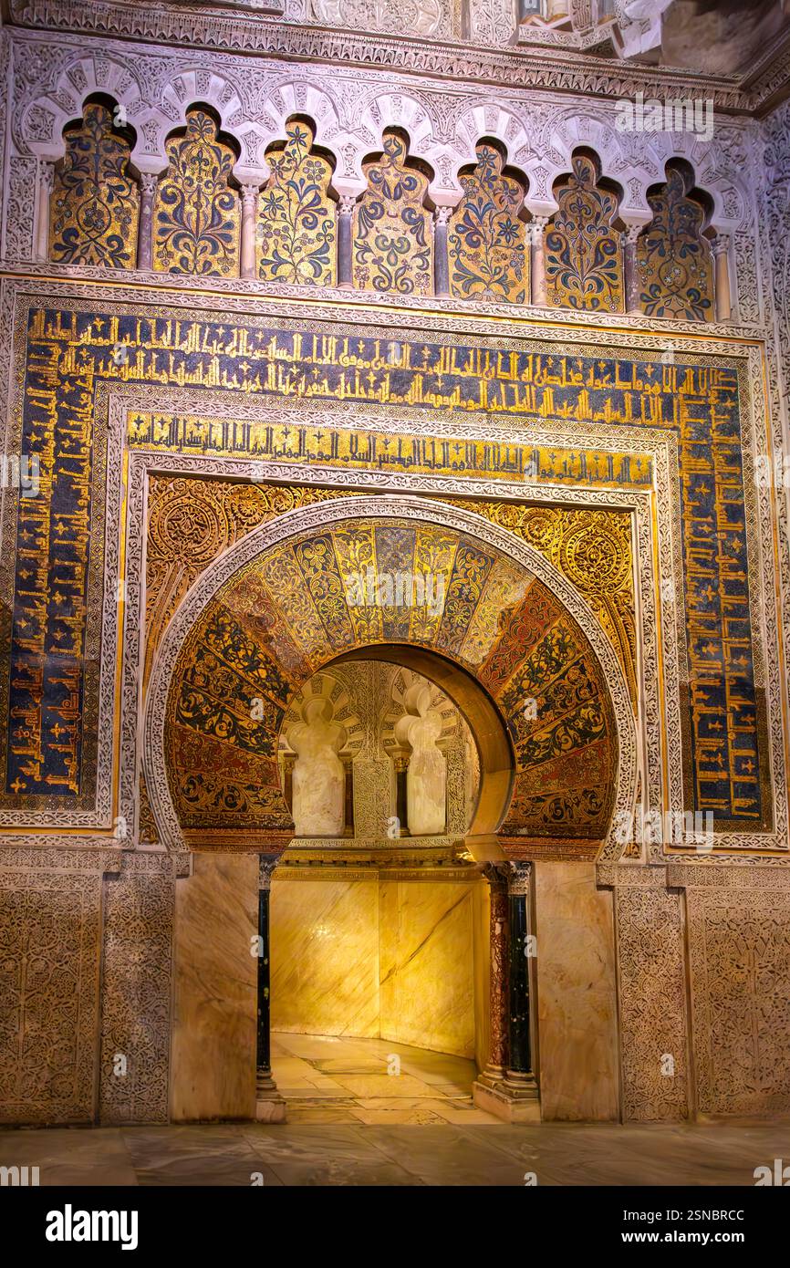 The golden arched mihrab or prayer niche used to identify the wall that ...